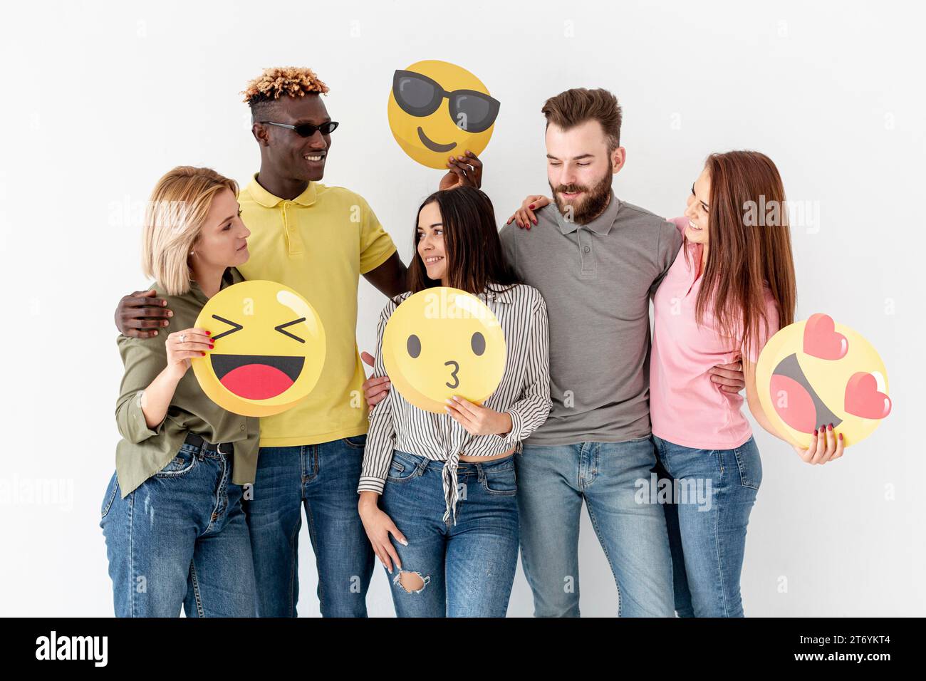 Group young friends with emoji Stock Photo - Alamy