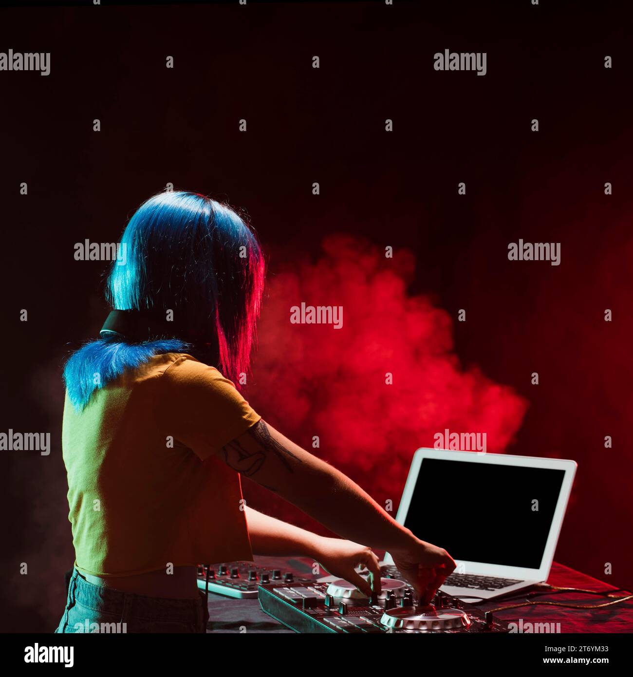 High angle woman dj mixing audio console Stock Photo - Alamy