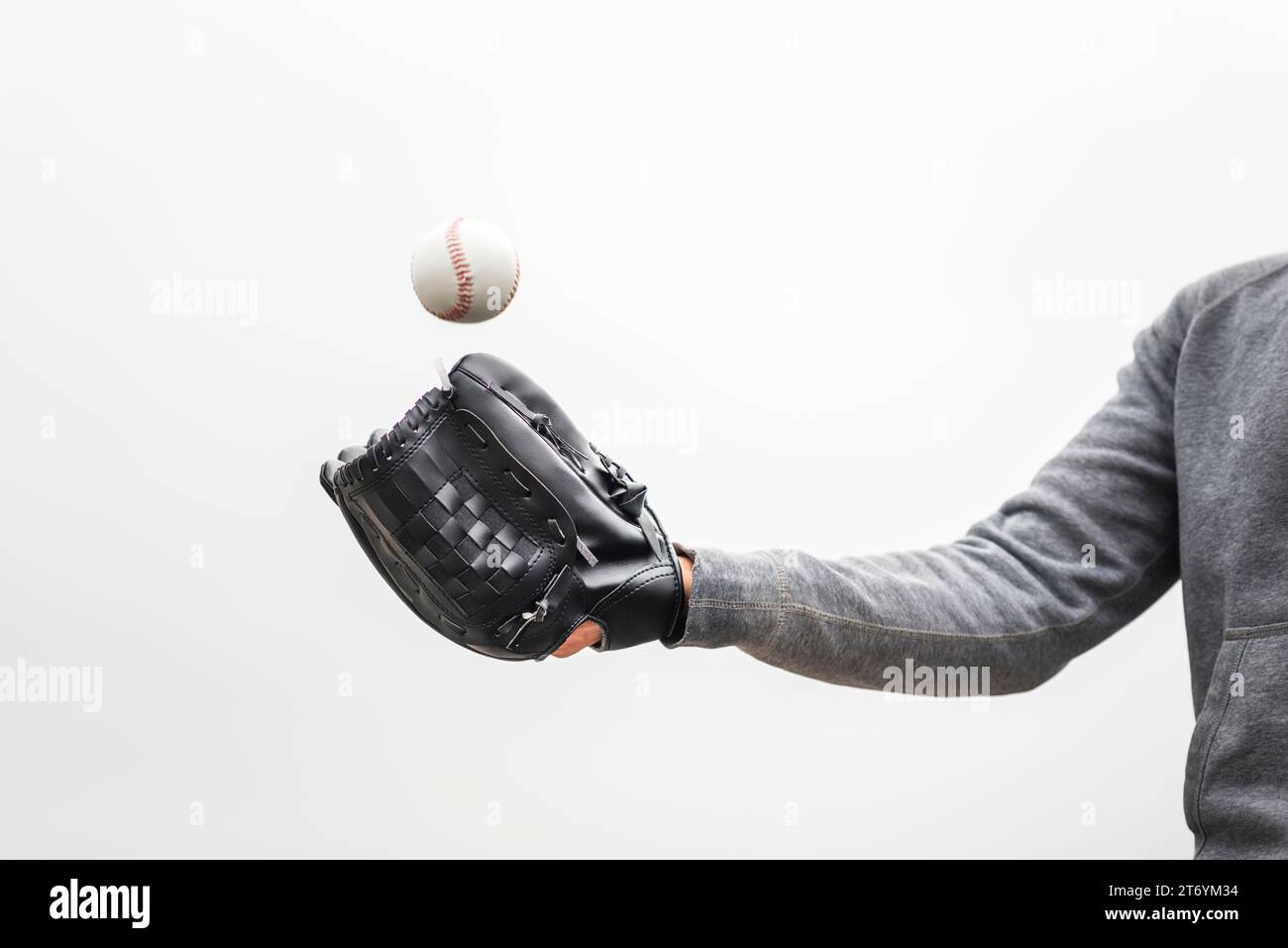 Holding bat and ball hi-res stock photography and images - Alamy