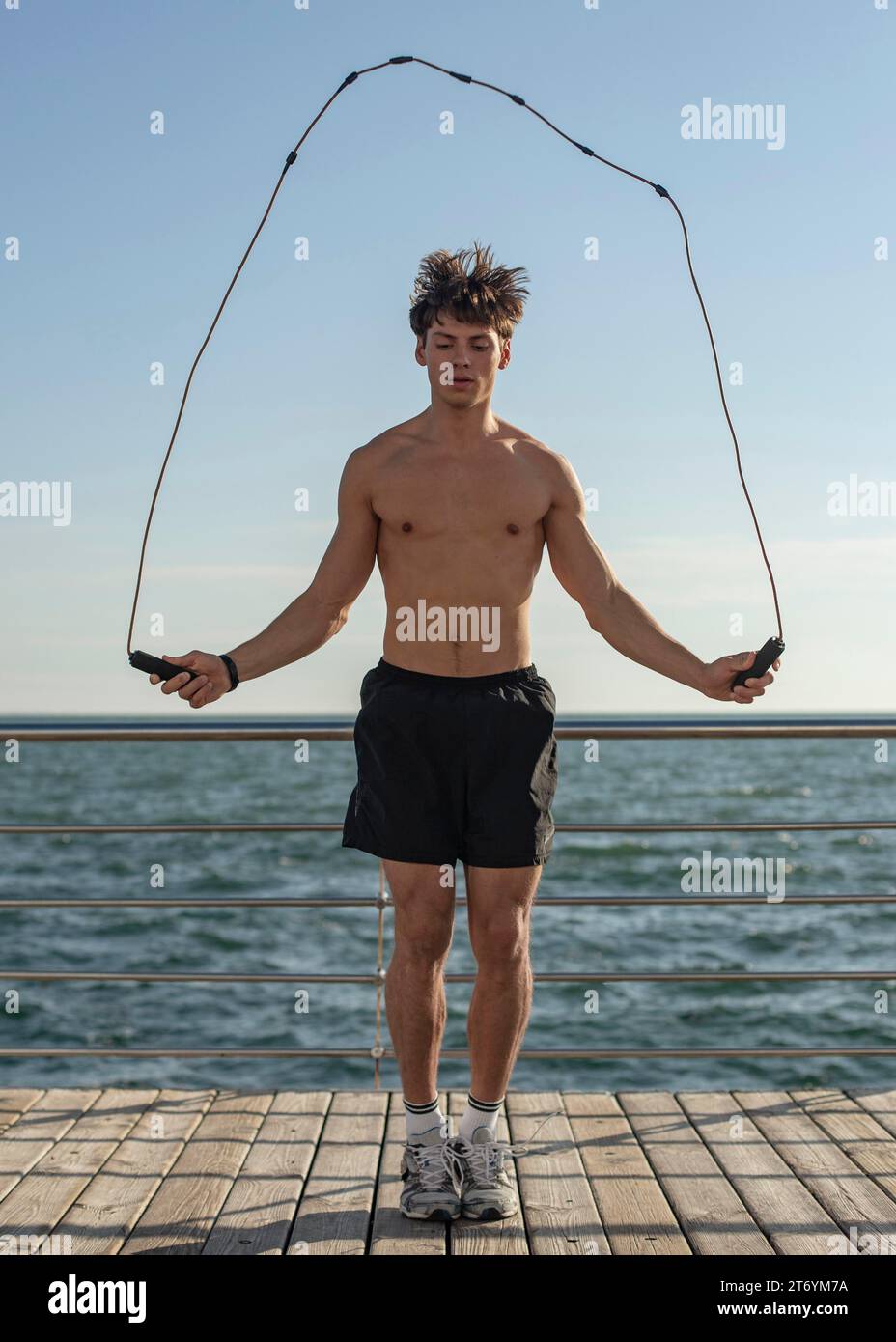 Man jumping rope and beach hi-res stock photography and images - Alamy