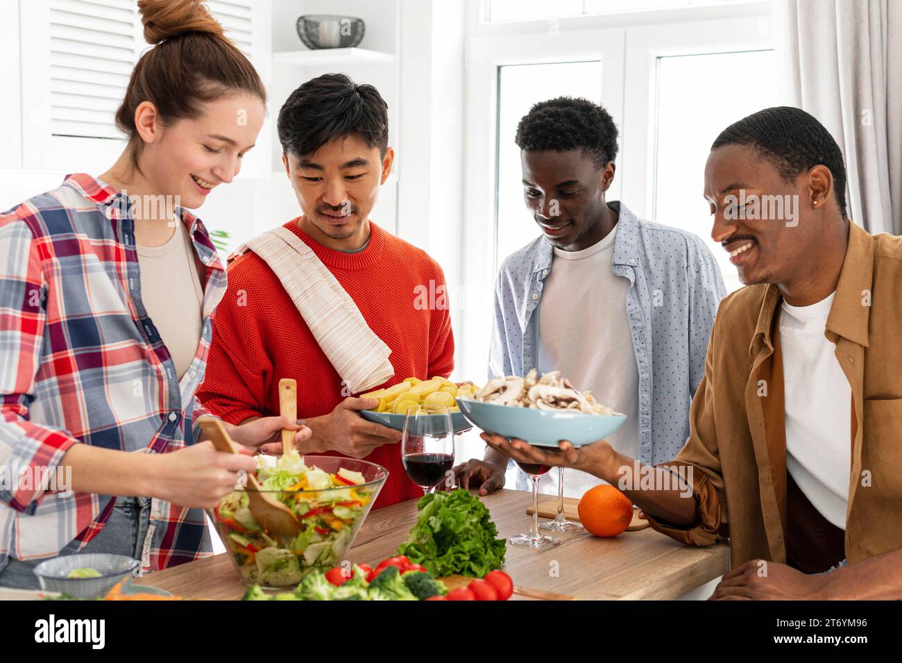 Medium shot roommates with food Stock Photo - Alamy