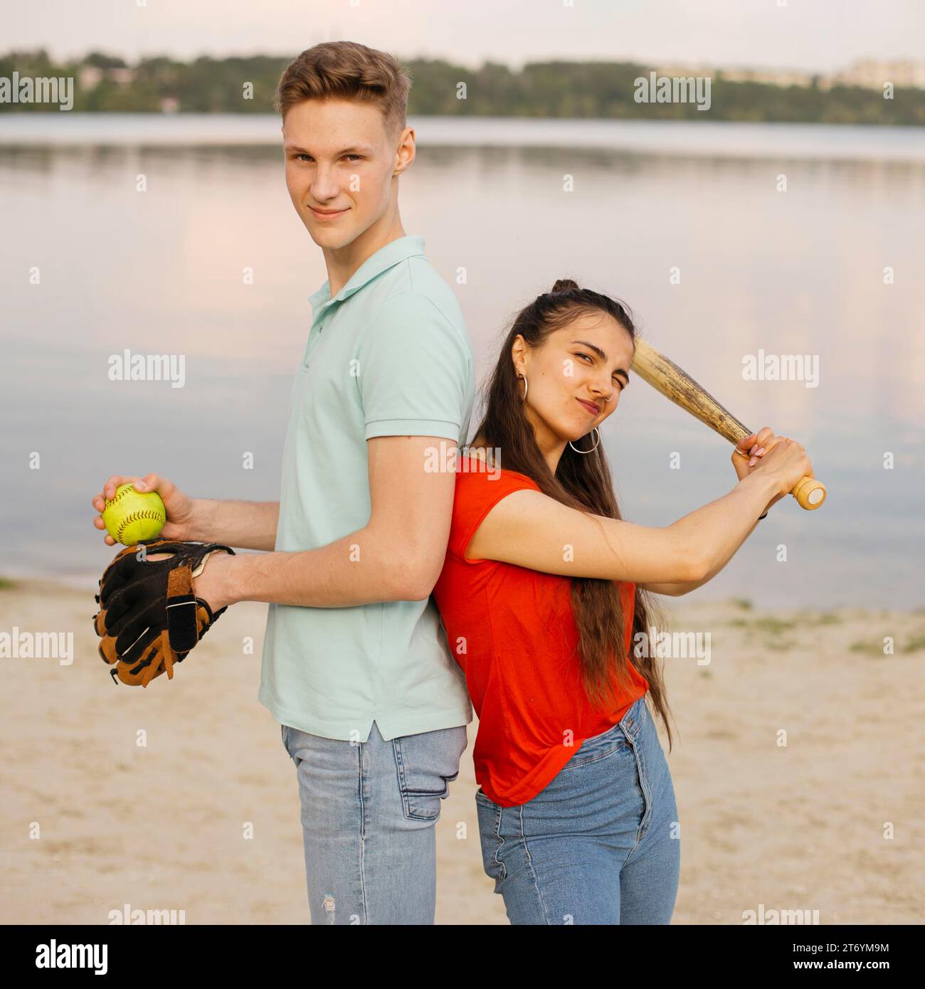 Medium shot smiley friends looking camera Stock Photo - Alamy