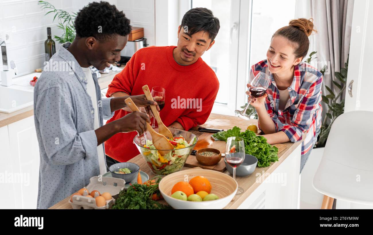 Medium shot roommates having fun Stock Photo - Alamy