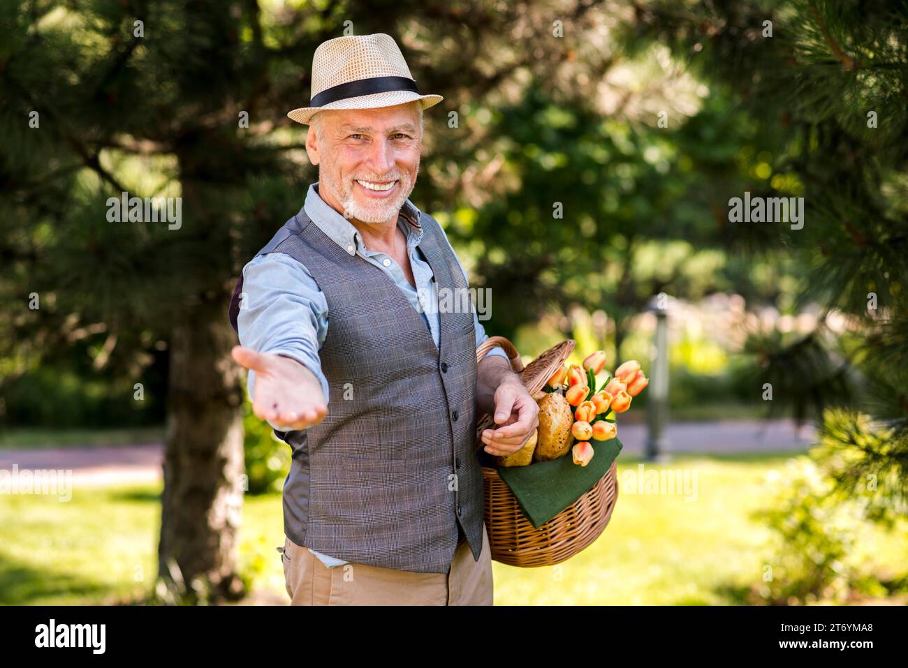 Medium shot man reaching out his hand camera Stock Photo - Alamy