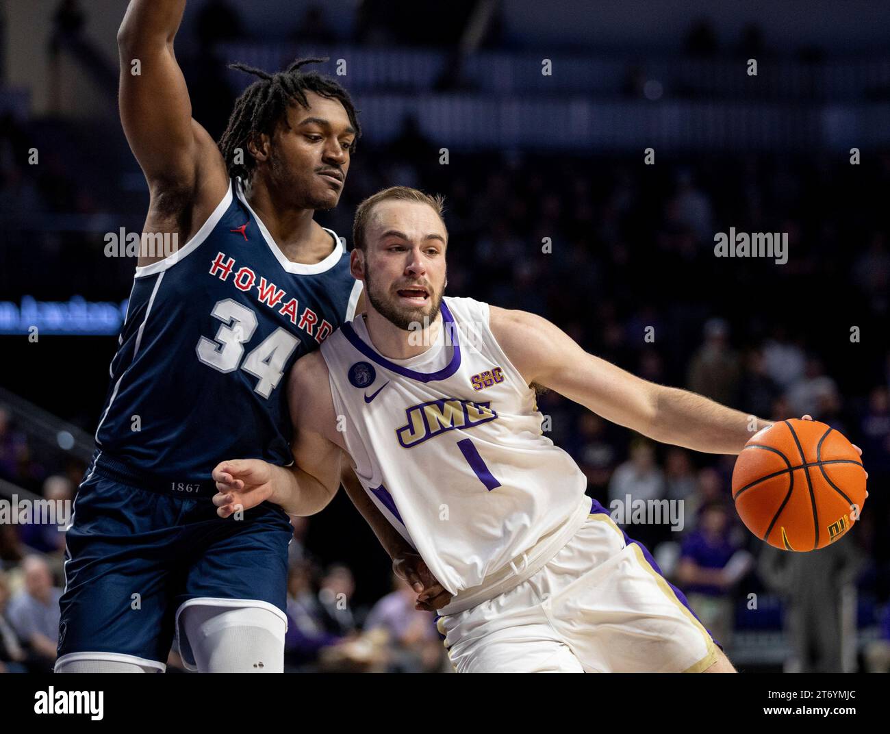 James Madison guard Noah Freidel (1) drives into the paint against ...