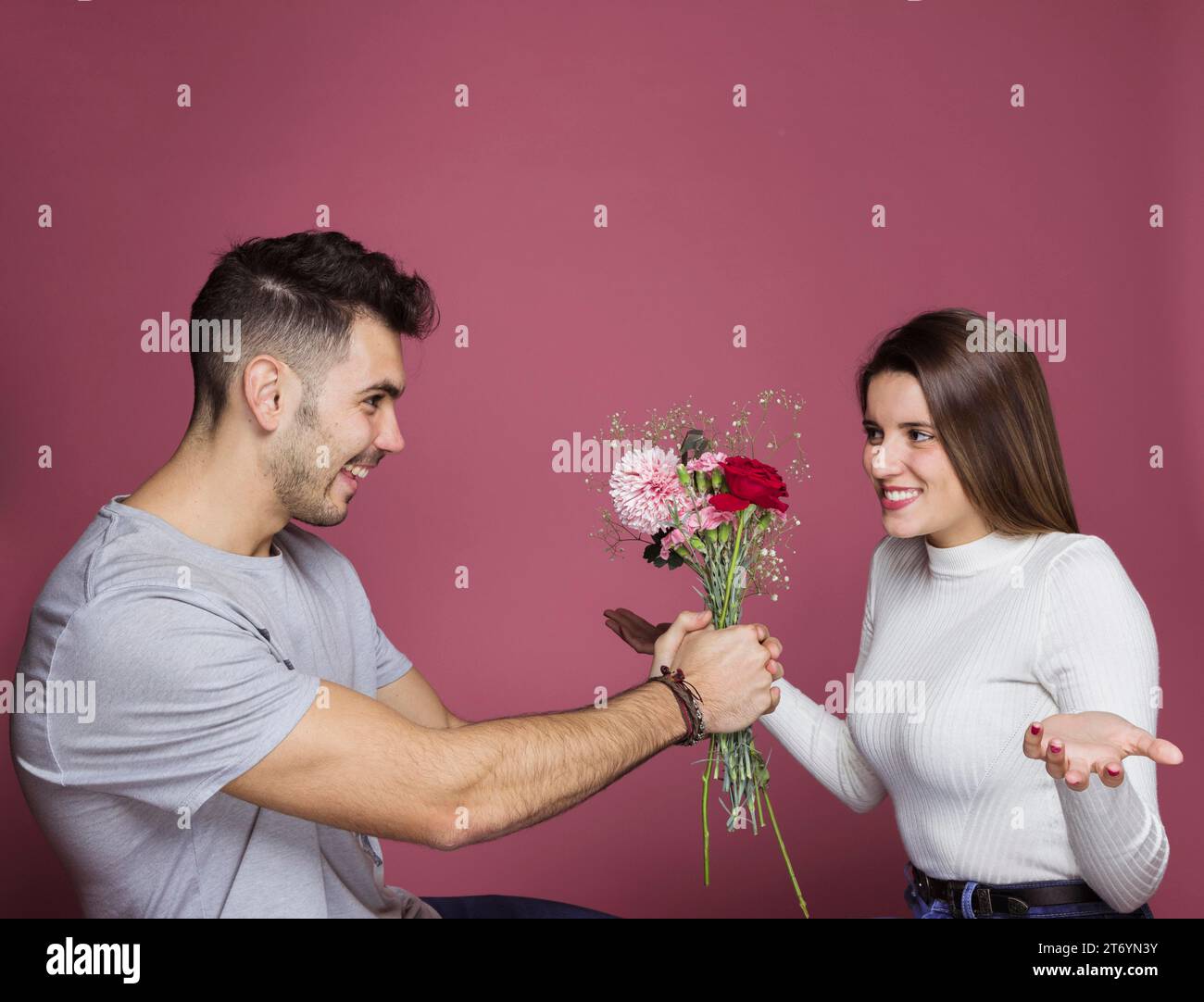 Attractive lady surprised fresh flowers hi-res stock photography and ...