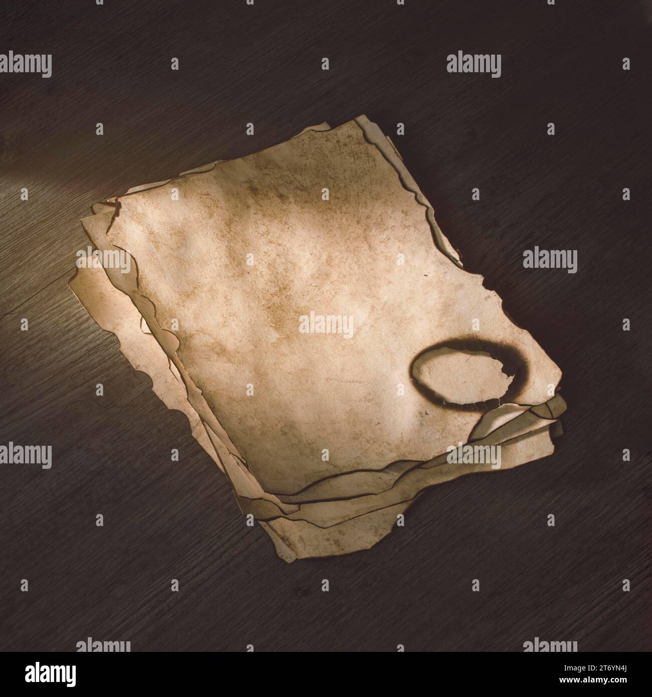 Stack op burnt paper sheets Stock Photo - Alamy