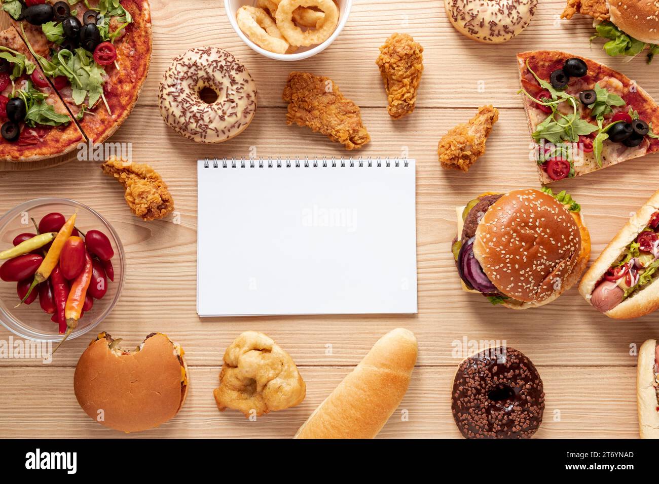 Top view arrangement with food notebook Stock Photo - Alamy