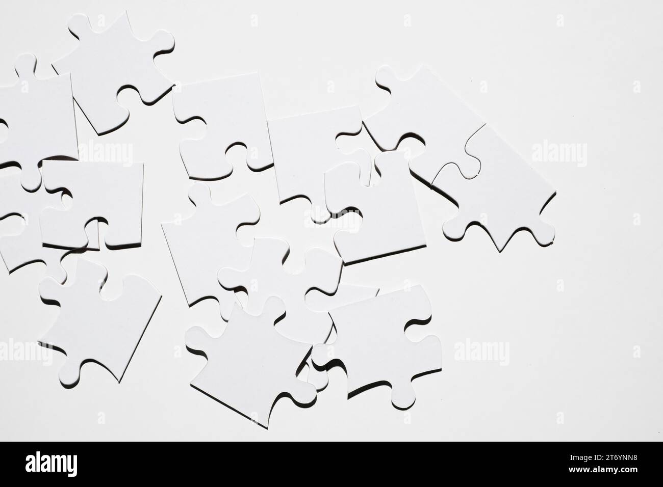 White puzzle pieces isolated white surface Stock Photo - Alamy