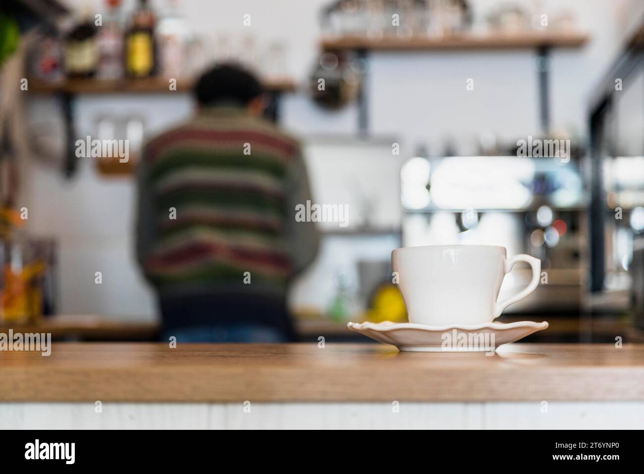 White coffee cup saucer coffee counter Stock Photo - Alamy