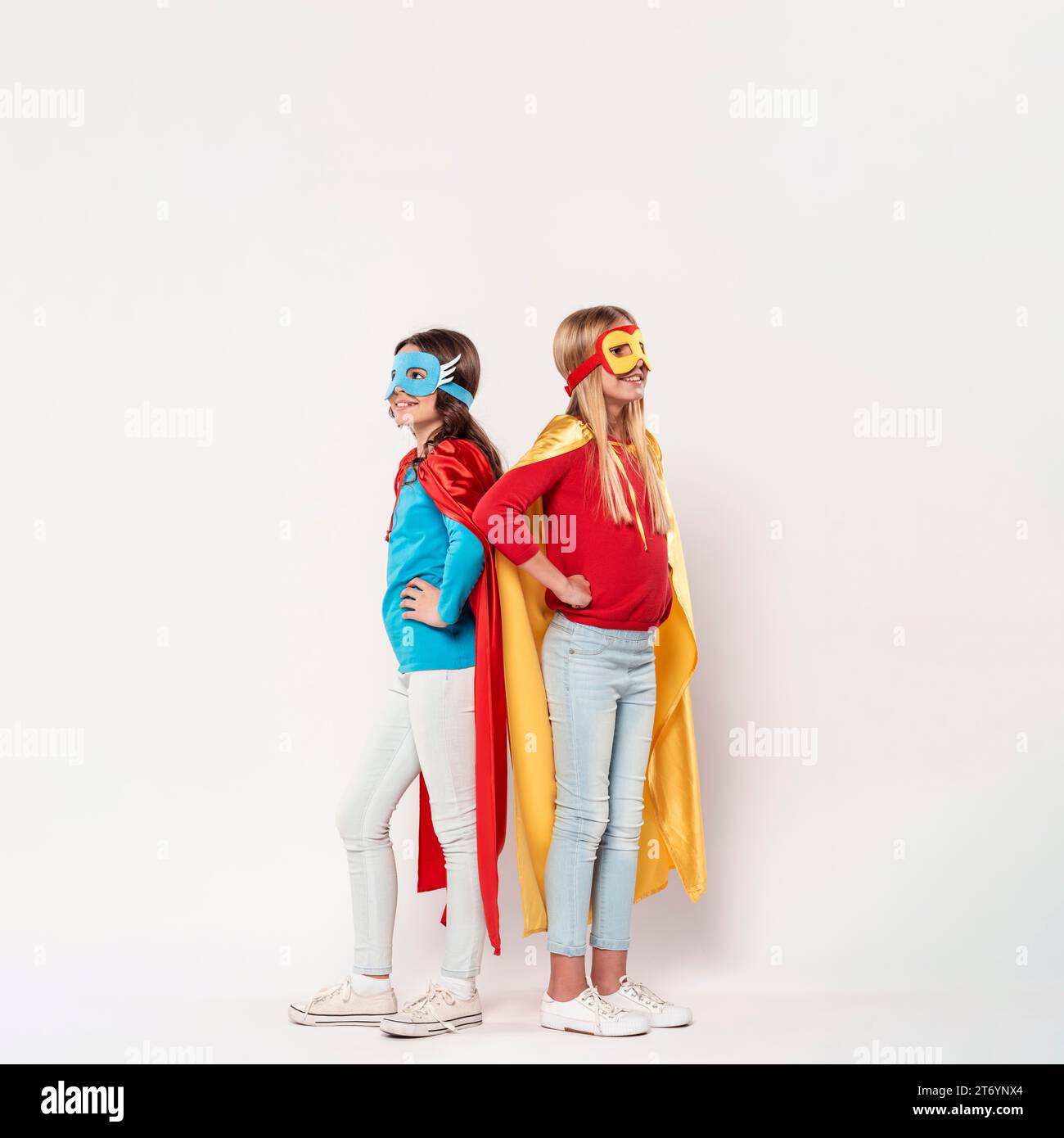 Young girls wearing superhero costume Stock Photo - Alamy