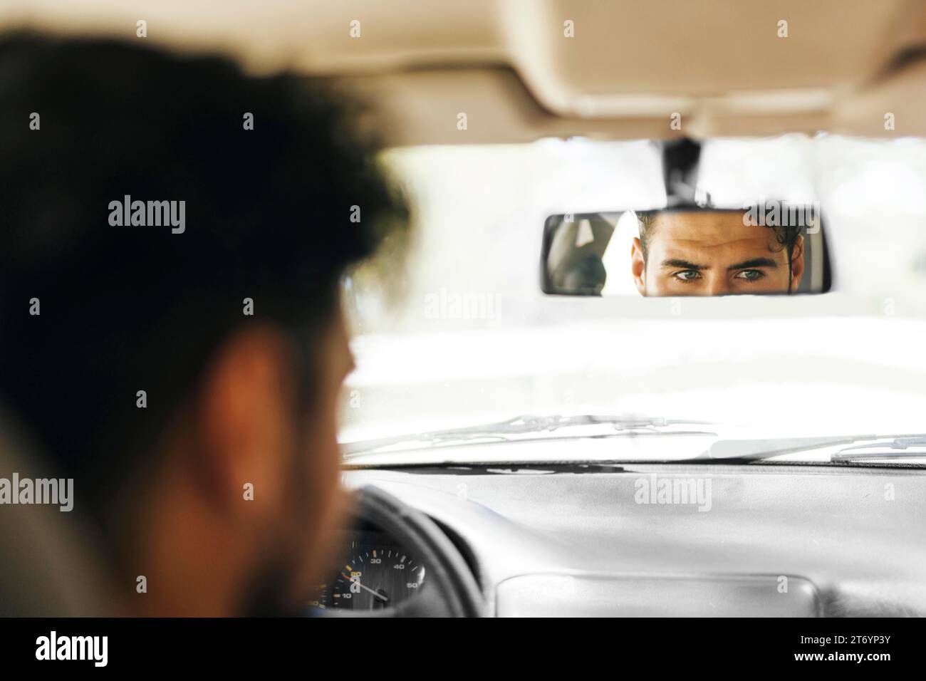 Checking the mirror hi-res stock photography and images - Alamy