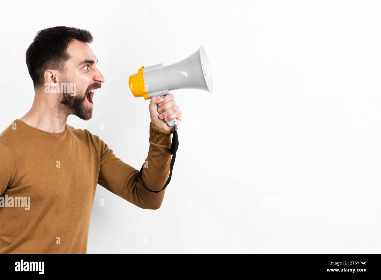 Angry man screaming megaphone Stock Photo - Alamy