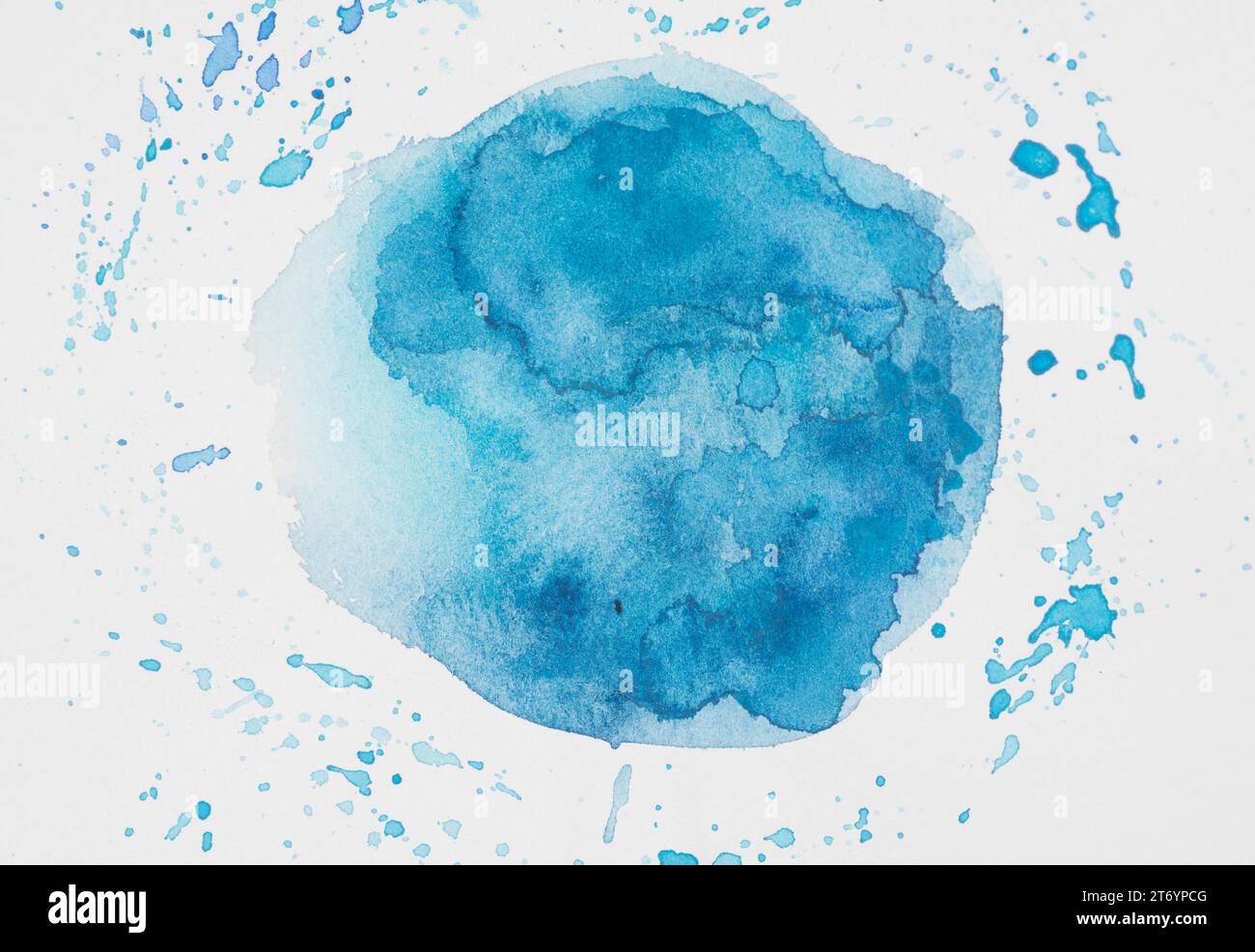 Blue mix paints white paper Stock Photo - Alamy