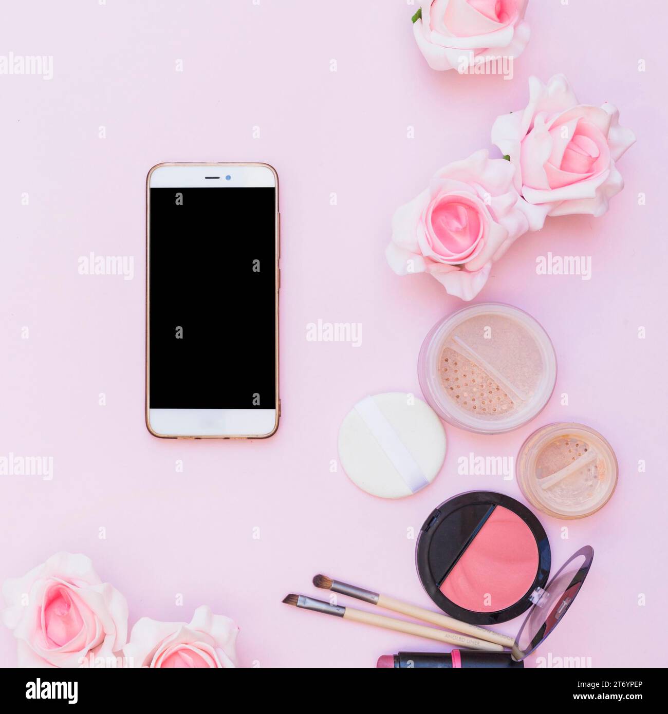 Cellphone cosmetics products flower pink background pink background ...