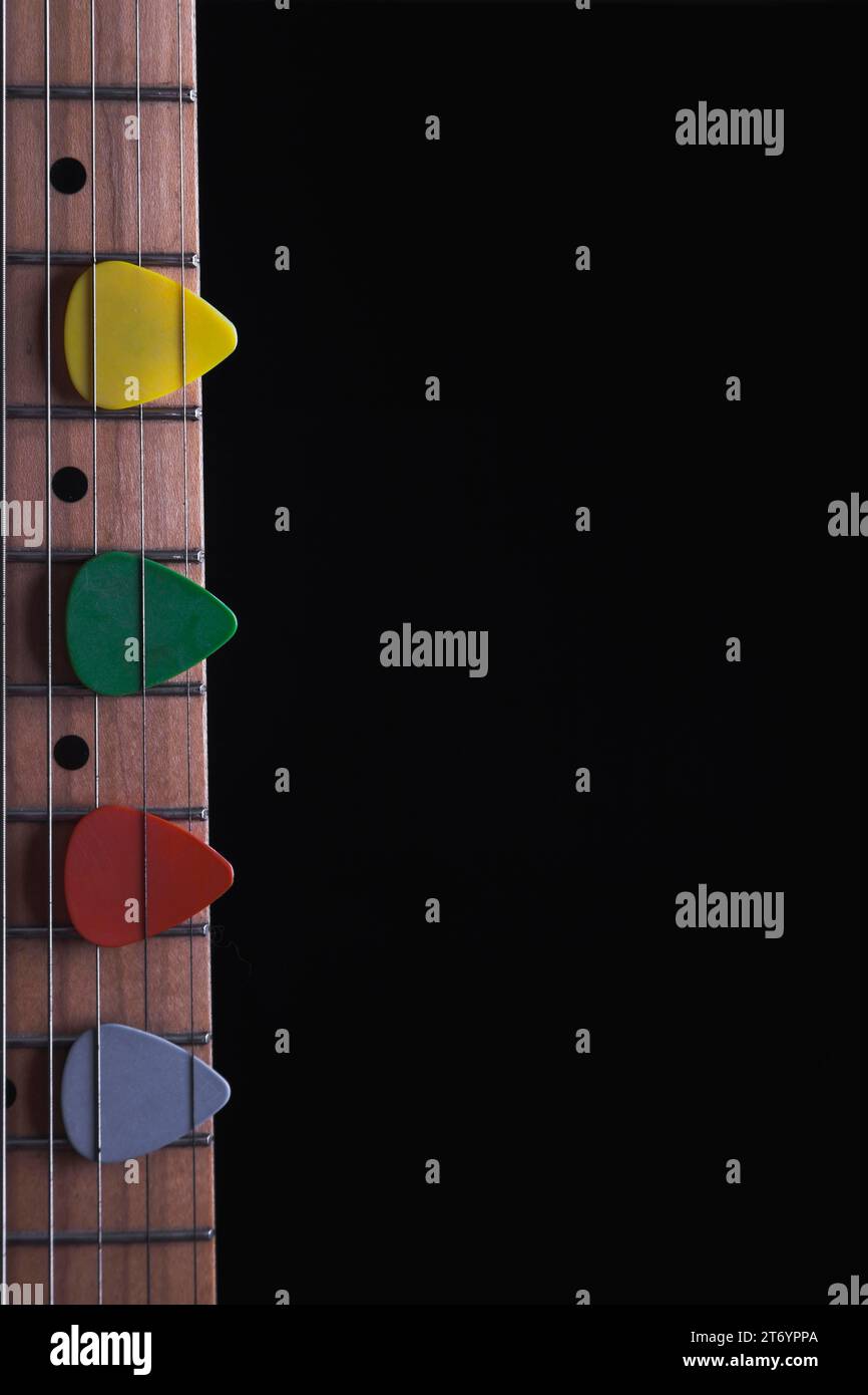 Colorful picks neck guitar Stock Photo - Alamy