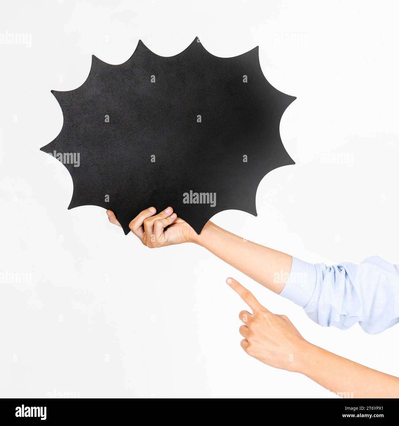 Crop hands pointing speech bubble Stock Photo - Alamy