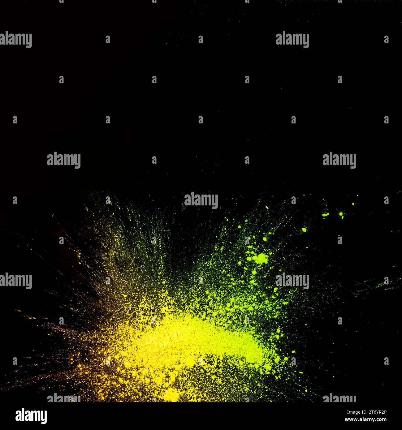 Elevated view yellow color powder explosion black background Stock ...