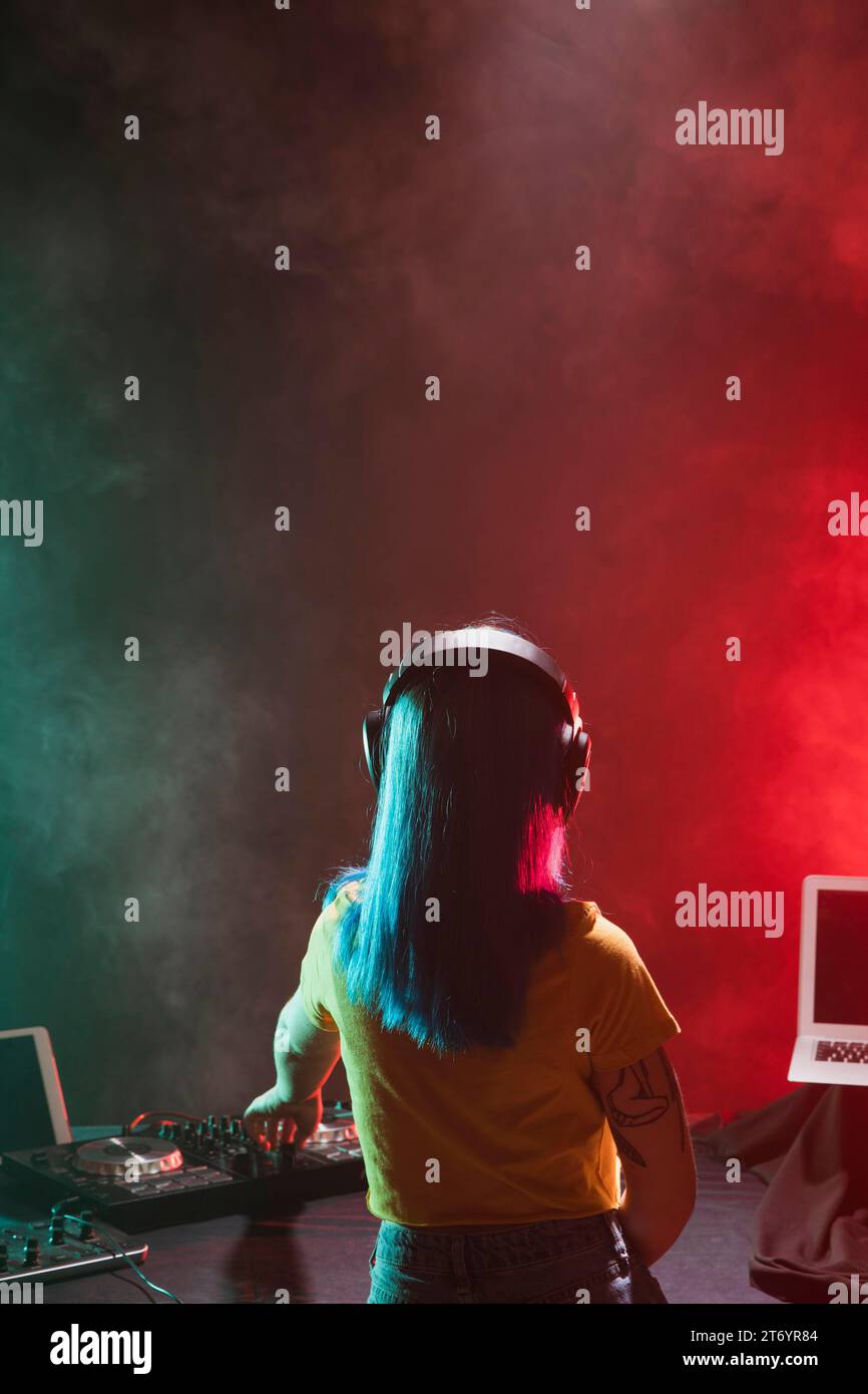 Female dj club mixing Stock Photo - Alamy