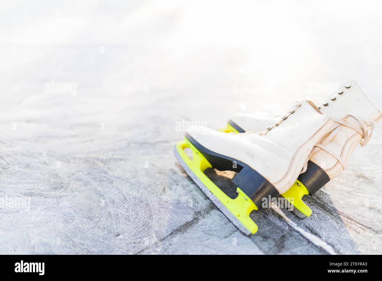 Figure skates scratched ice Stock Photo - Alamy