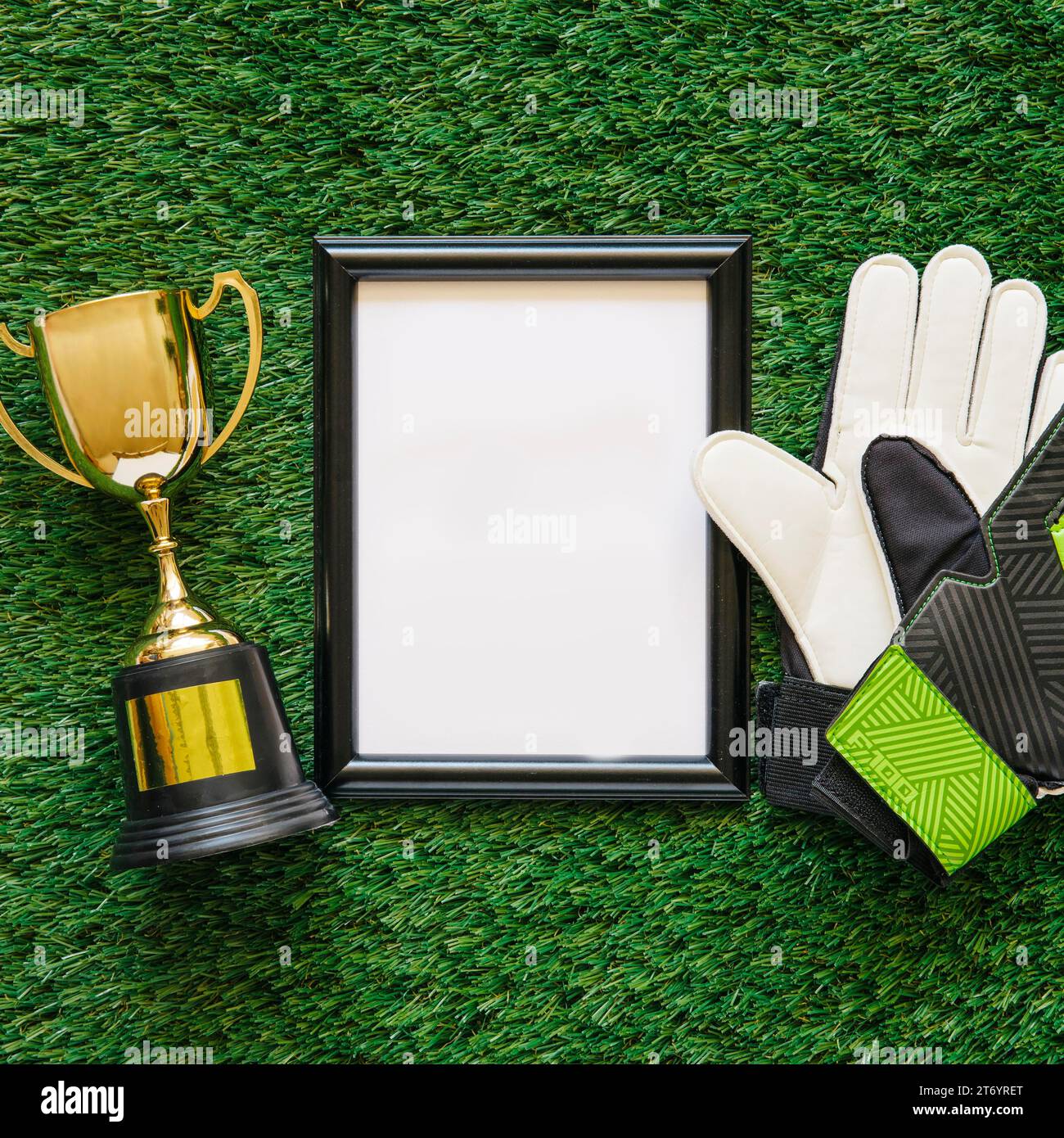 Football composition with frame goalkeeper gloves Stock Photo - Alamy