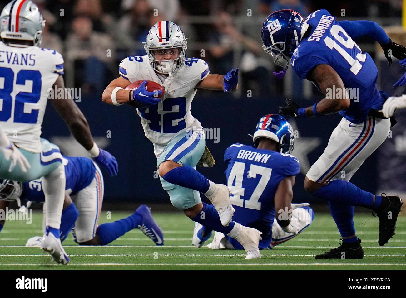 Dallas Cowboys running back Deuce Vaughn (42) carries against New York ...