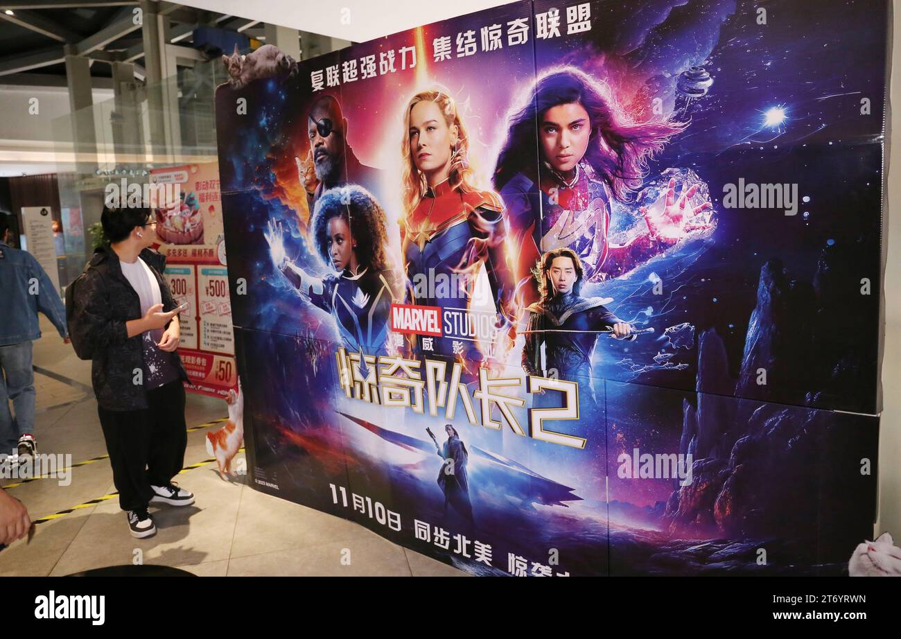 SHANGHAI, CHINA - NOVEMBER 10, 2023 - Fans walk past a poster of The ...