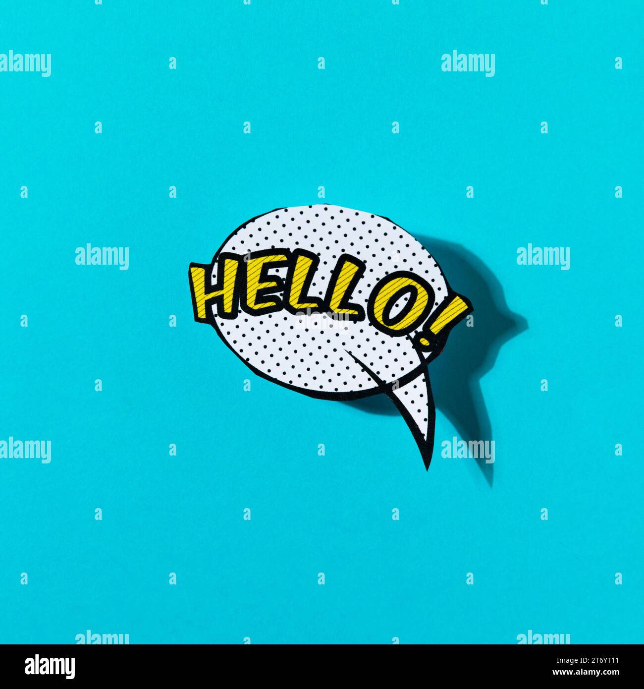 Hello lettering text speech bubble turquoise backdrop Stock Photo - Alamy
