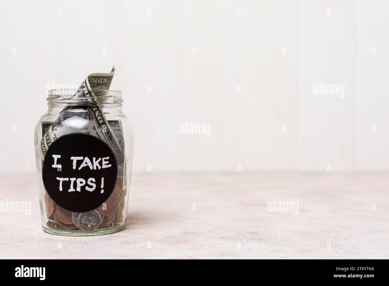 I take tips glass with copy space background Stock Photo - Alamy