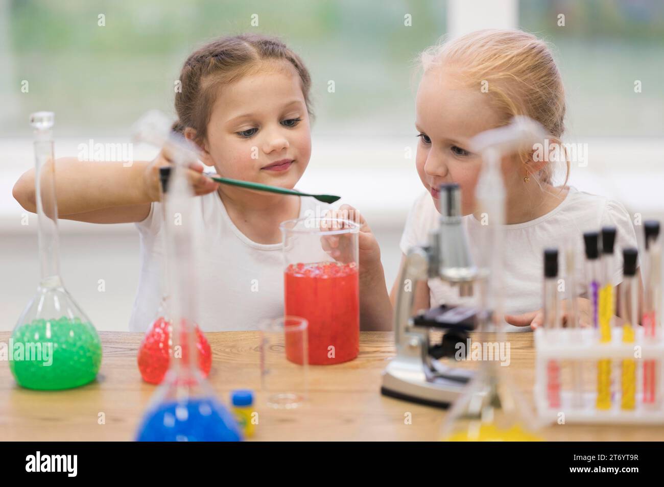 Diverse girls science experiment hi-res stock photography and images ...
