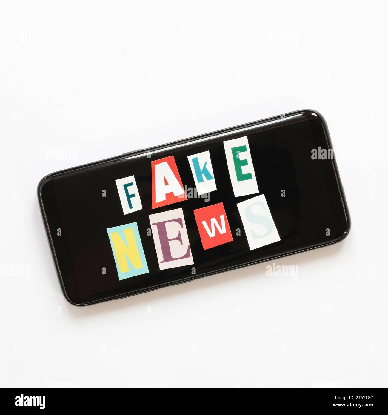 Mobile screen with fake news message Stock Photo - Alamy