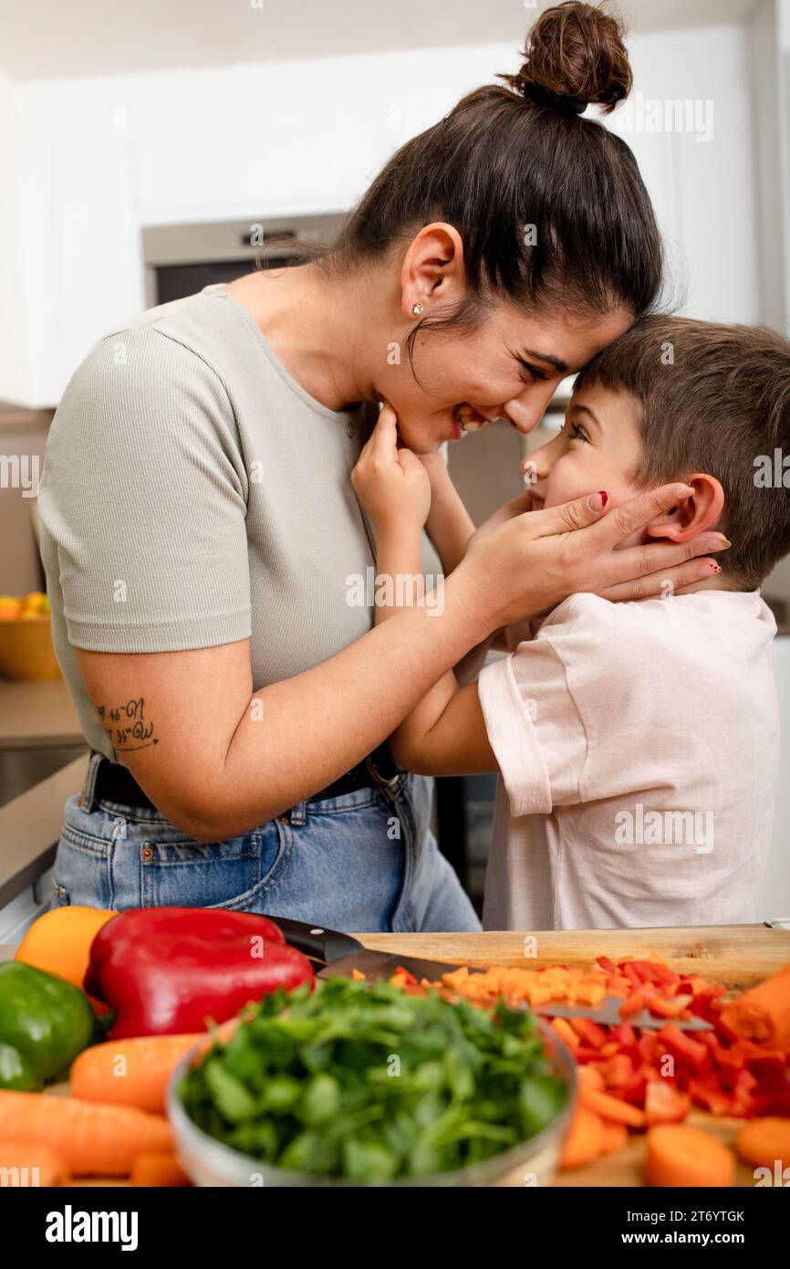 Medium shot mother son looking hi-res stock photography and images - Alamy