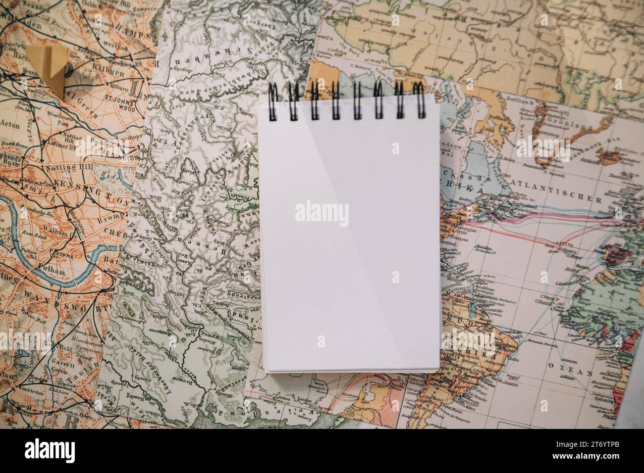 Notebook paper plane map Stock Photo - Alamy