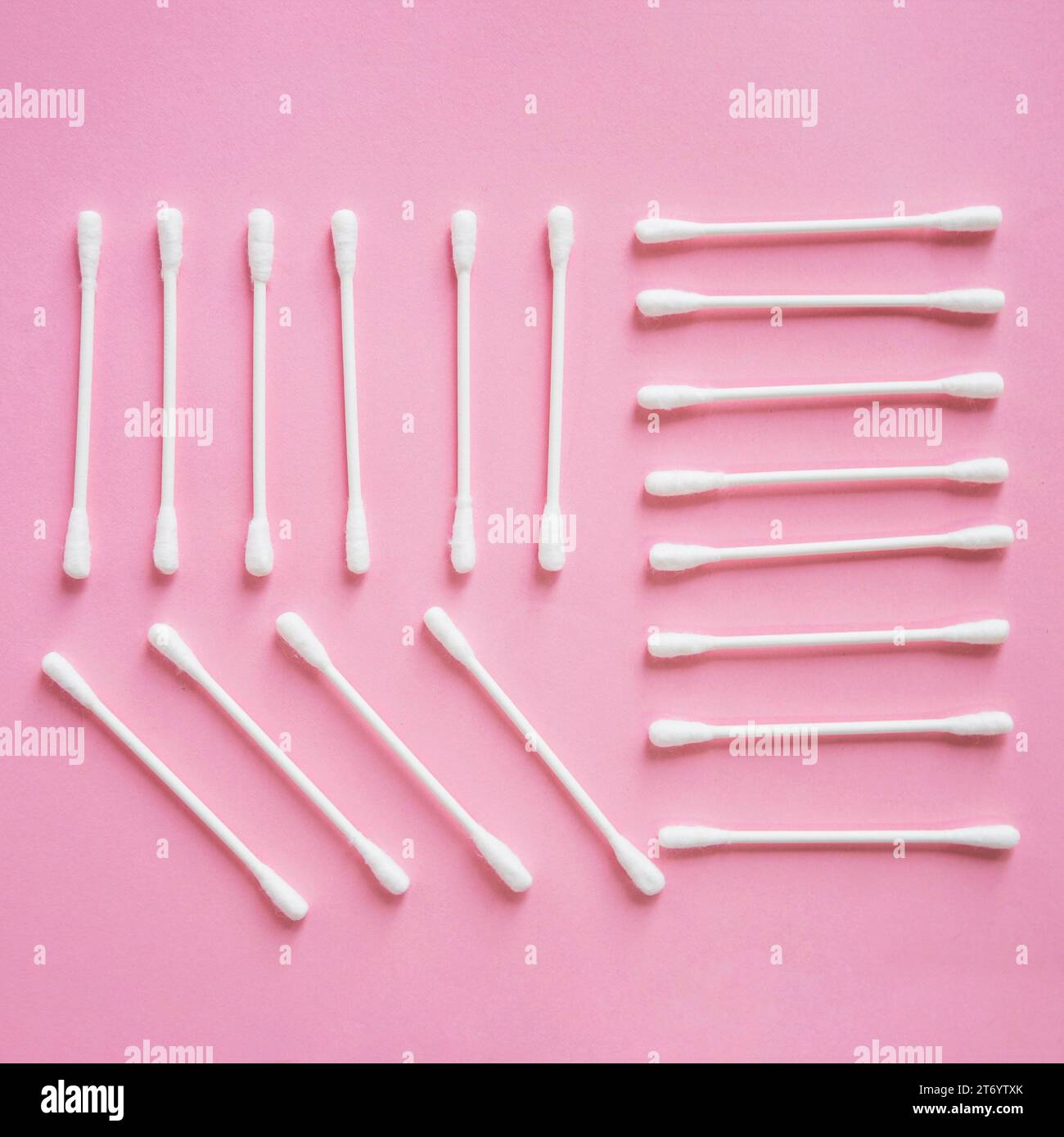 Overhead view cotton swab arranged pink background Stock Photo - Alamy