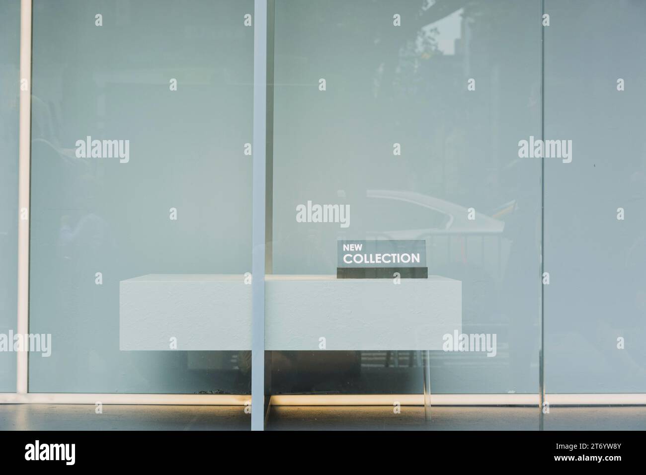 Shop window with new collection Stock Photo - Alamy