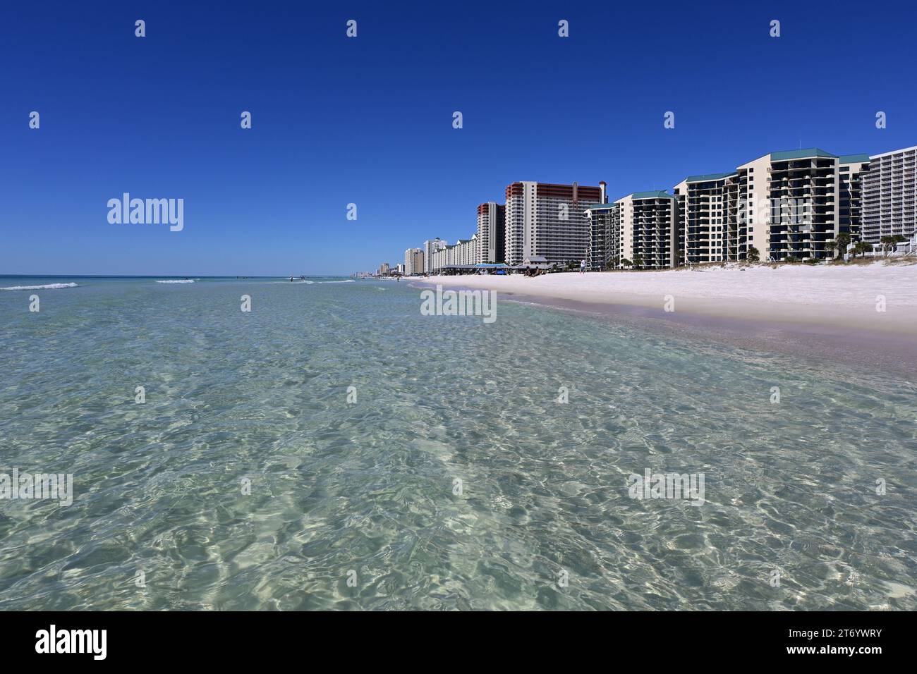 White sand beach, crystal clear water and beachfront residential ...
