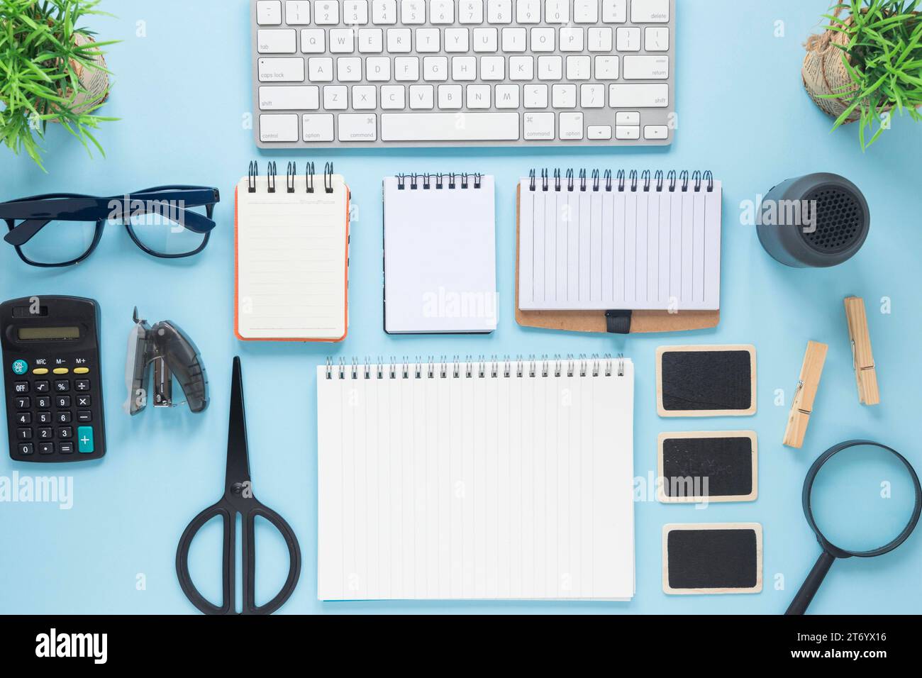 Top view business mockup blue office desk Stock Photo - Alamy