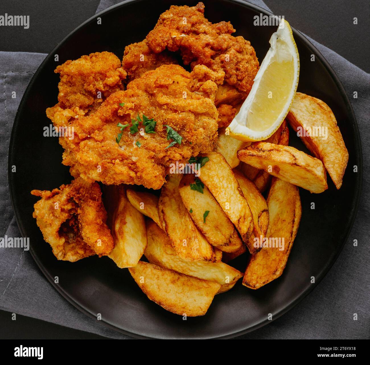 Top view fish chips plate with lemon slice Stock Photo - Alamy