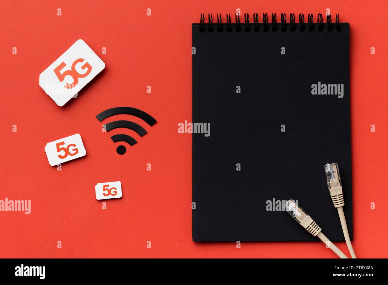 Top view notebook with sim card ethernet cables Stock Photo - Alamy