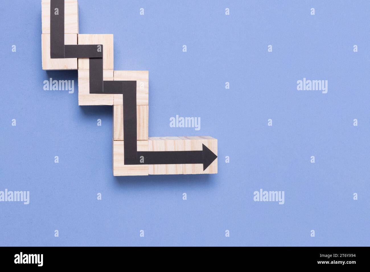 Top view snake game arrow with wooden outline Stock Photo - Alamy
