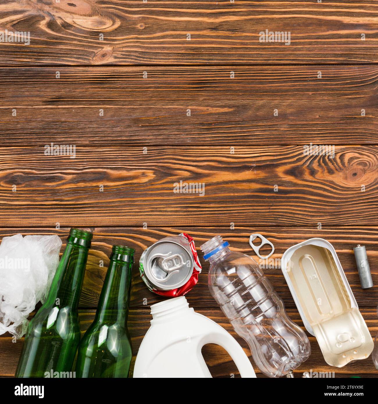 Various type recycling garbage wooden desk Stock Photo - Alamy