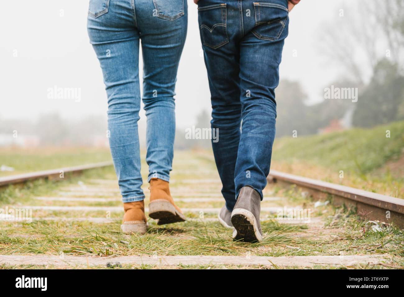 Couple walking along railway hi-res stock photography and images - Alamy