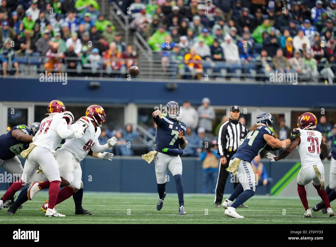 Seattle Seahawks quarterback Geno Smith (7) looks to pass in the first ...