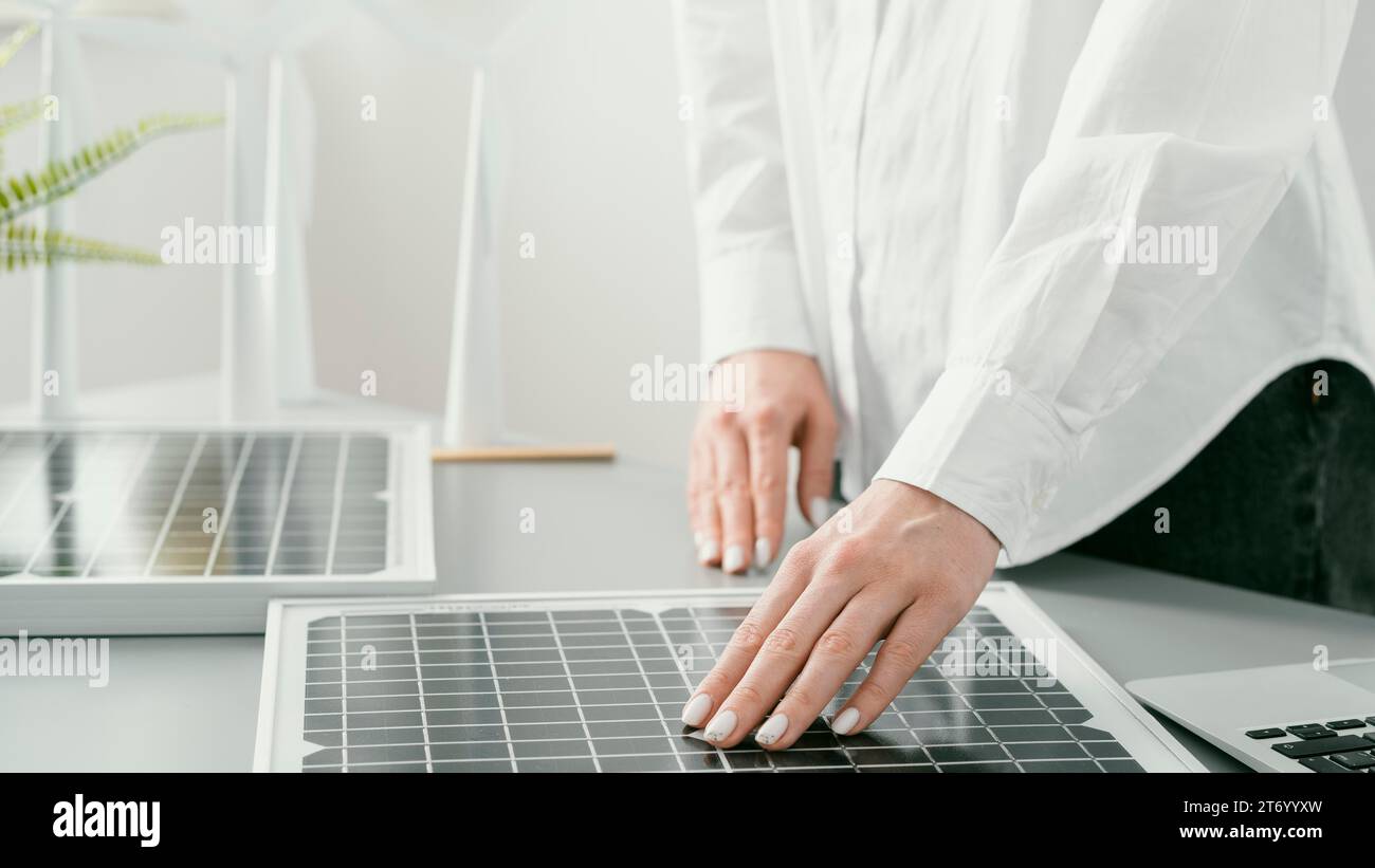 Close up hands touching eco project Stock Photo - Alamy