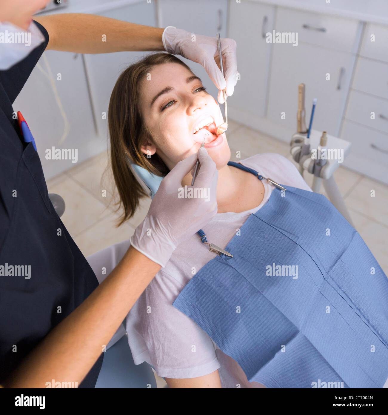 Close up woman getting dental check up Stock Photo - Alamy