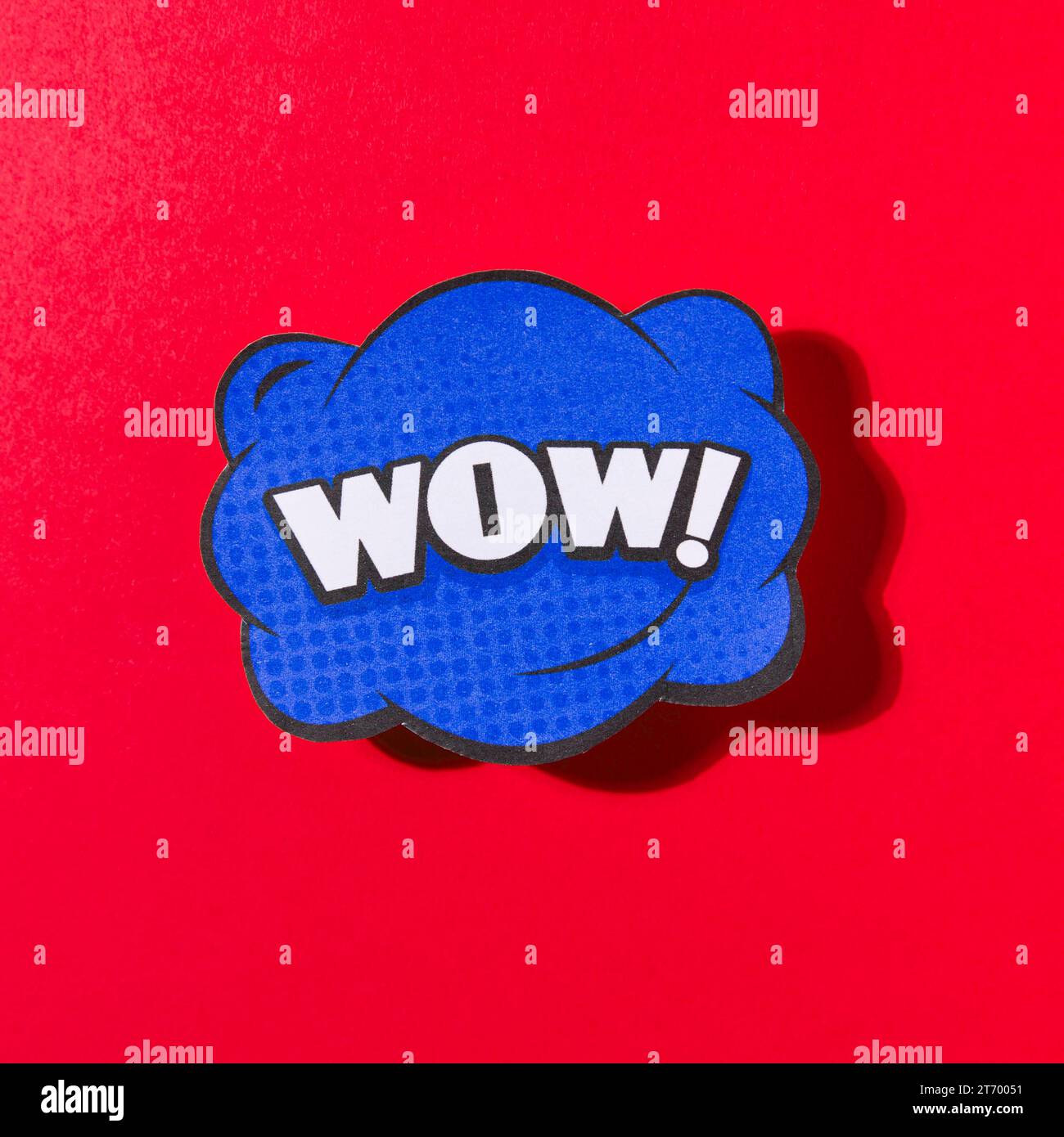 Comic lettering wow red background Stock Photo - Alamy