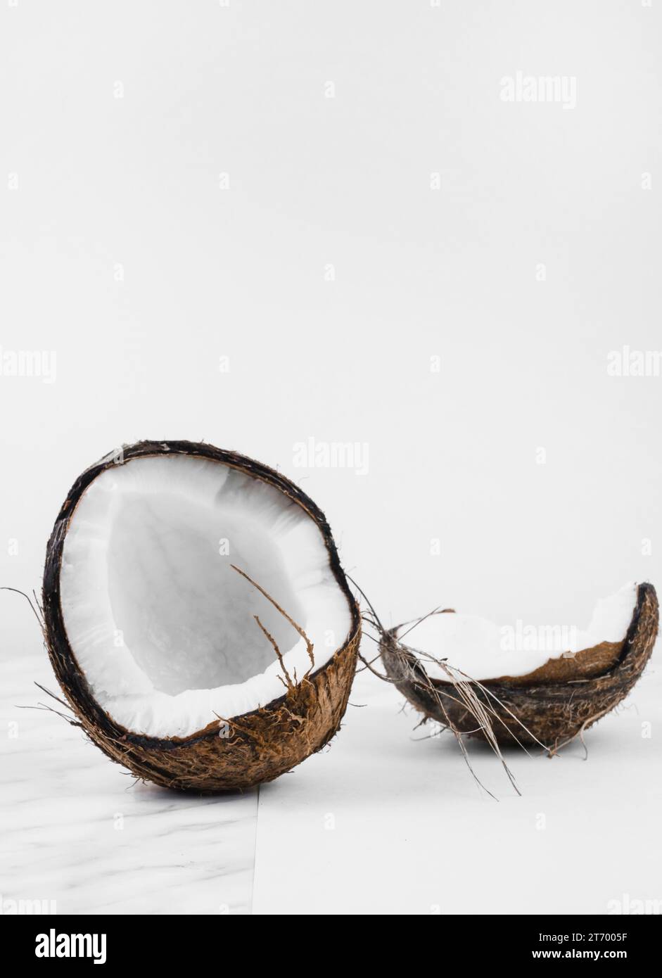 Coconut shell white background Stock Photo - Alamy