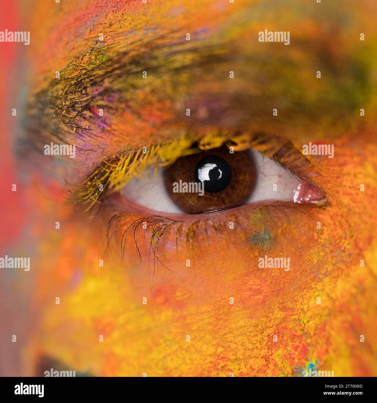 Eye with face stained paint Stock Photo - Alamy