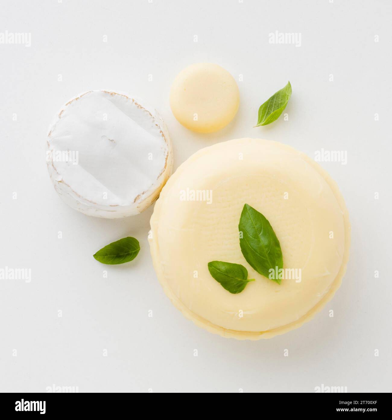 Flat lay assortment round cheese Stock Photo - Alamy