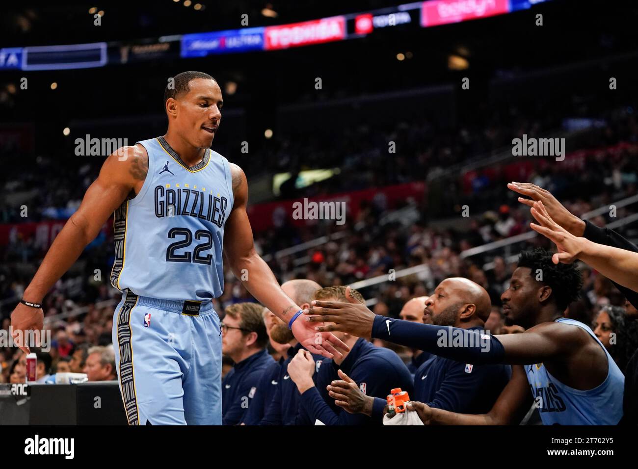 Memphis Grizzlies guard Desmond Bane, left, greets the bench after ...